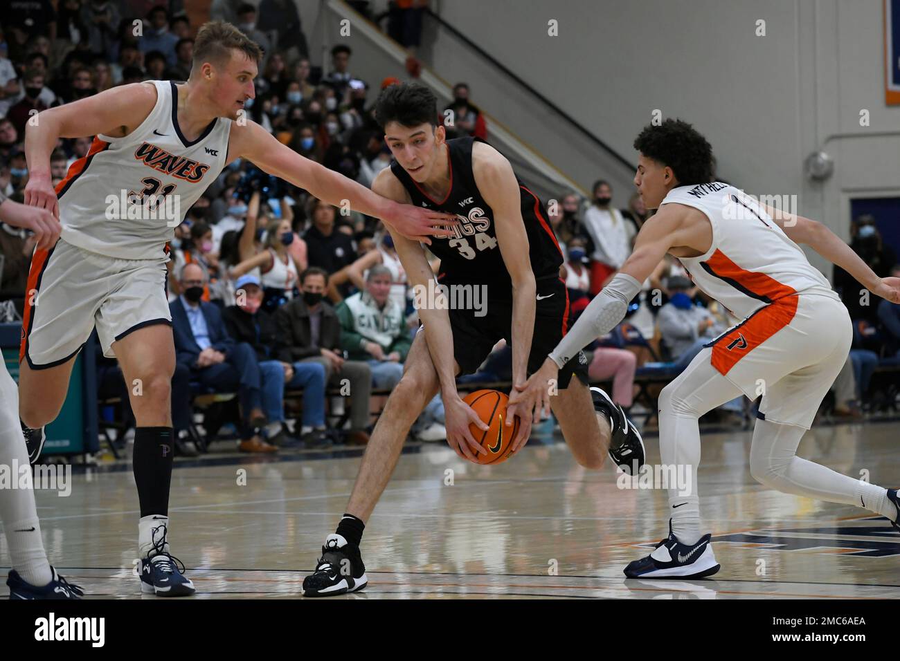 Gonzaga center Chet Holmgren (34) is guarded by Pepperdine forward Jan ...