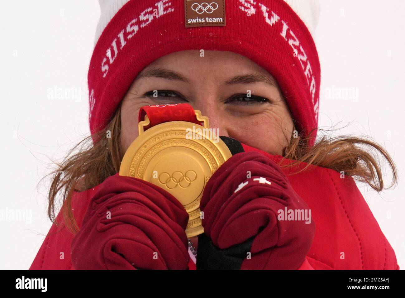 Michelle Gisin of Switzerland celebrates winning the gold medal during ...