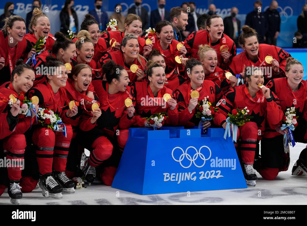 Canada poses for photos after defeating the United States in the women ...