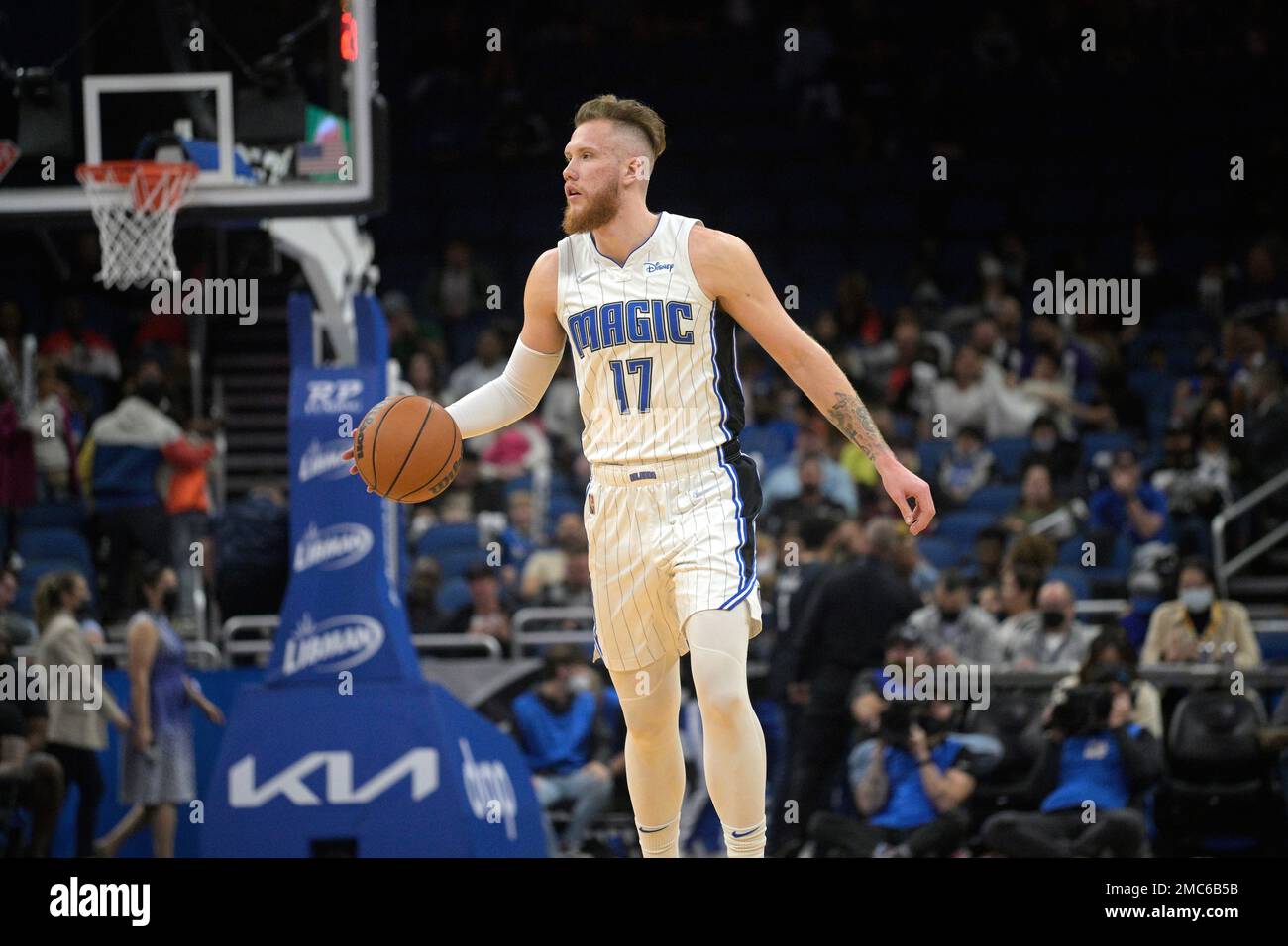 Orlando Magic forward Ignas Brazdeikis (17) brings the ball up the ...