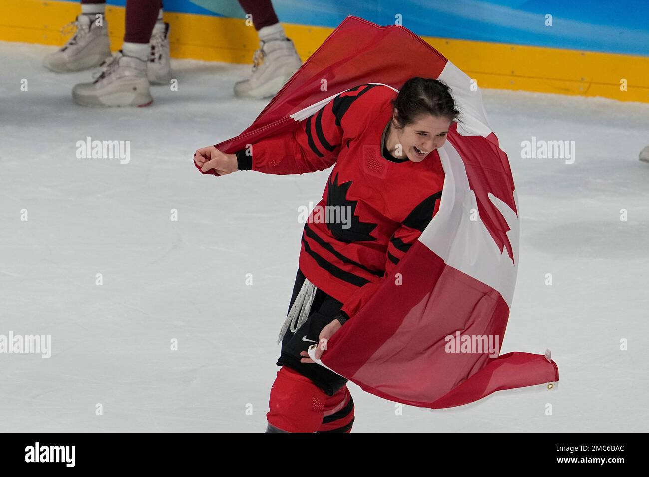 Canada's Jamie Lee Rattray celebrates with a Canadian flag after ...