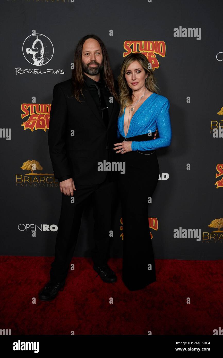 BJ McDonnell, left, director of "Studio 666," poses with his wife ...