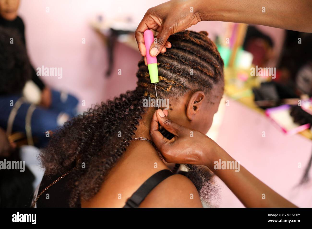 Making African braids in Ndola, Zambia on January 21, 2023 African braids are famous all over ...