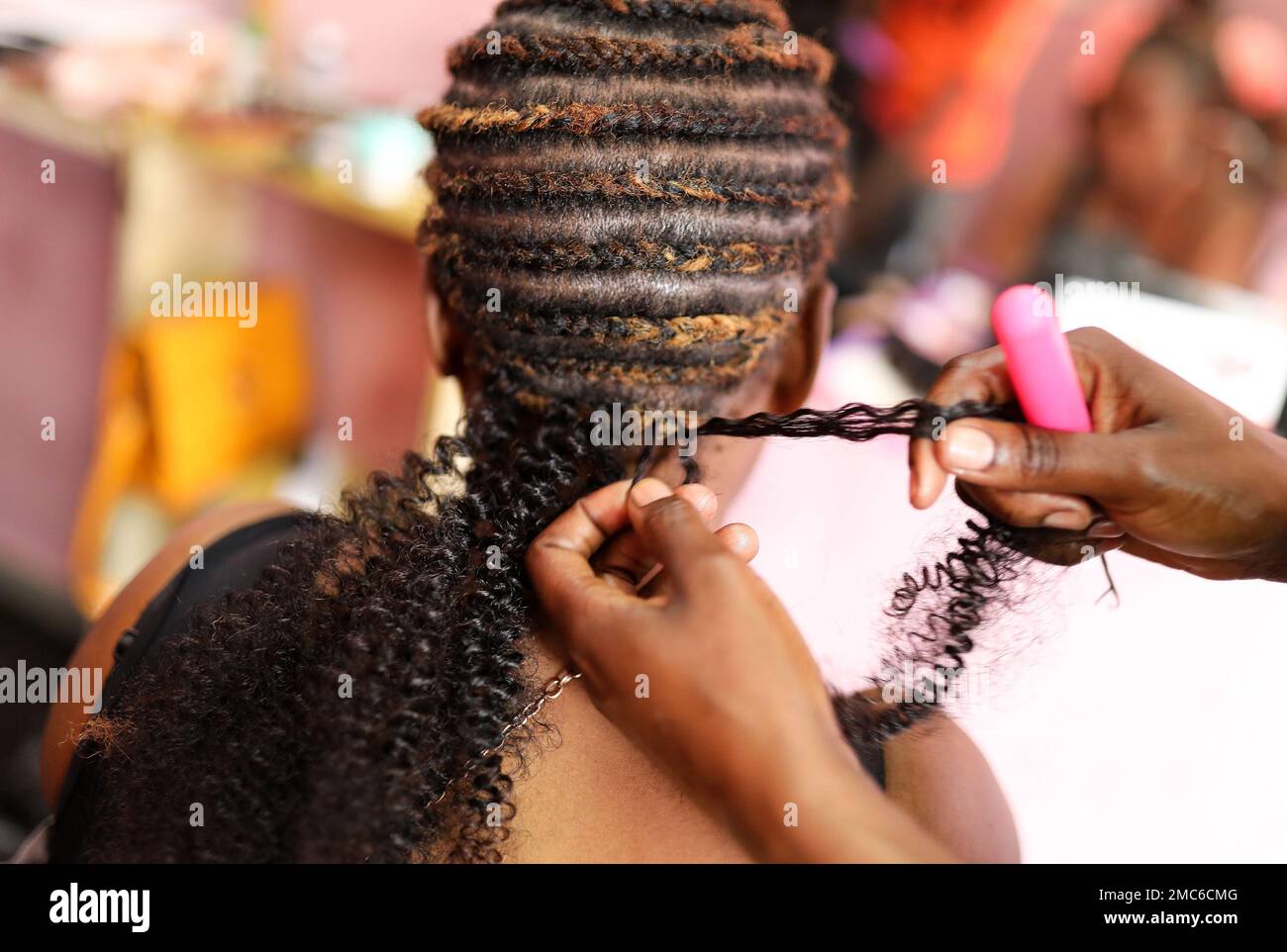 Making African braids in Ndola, Zambia on January 21, 2023 African ...