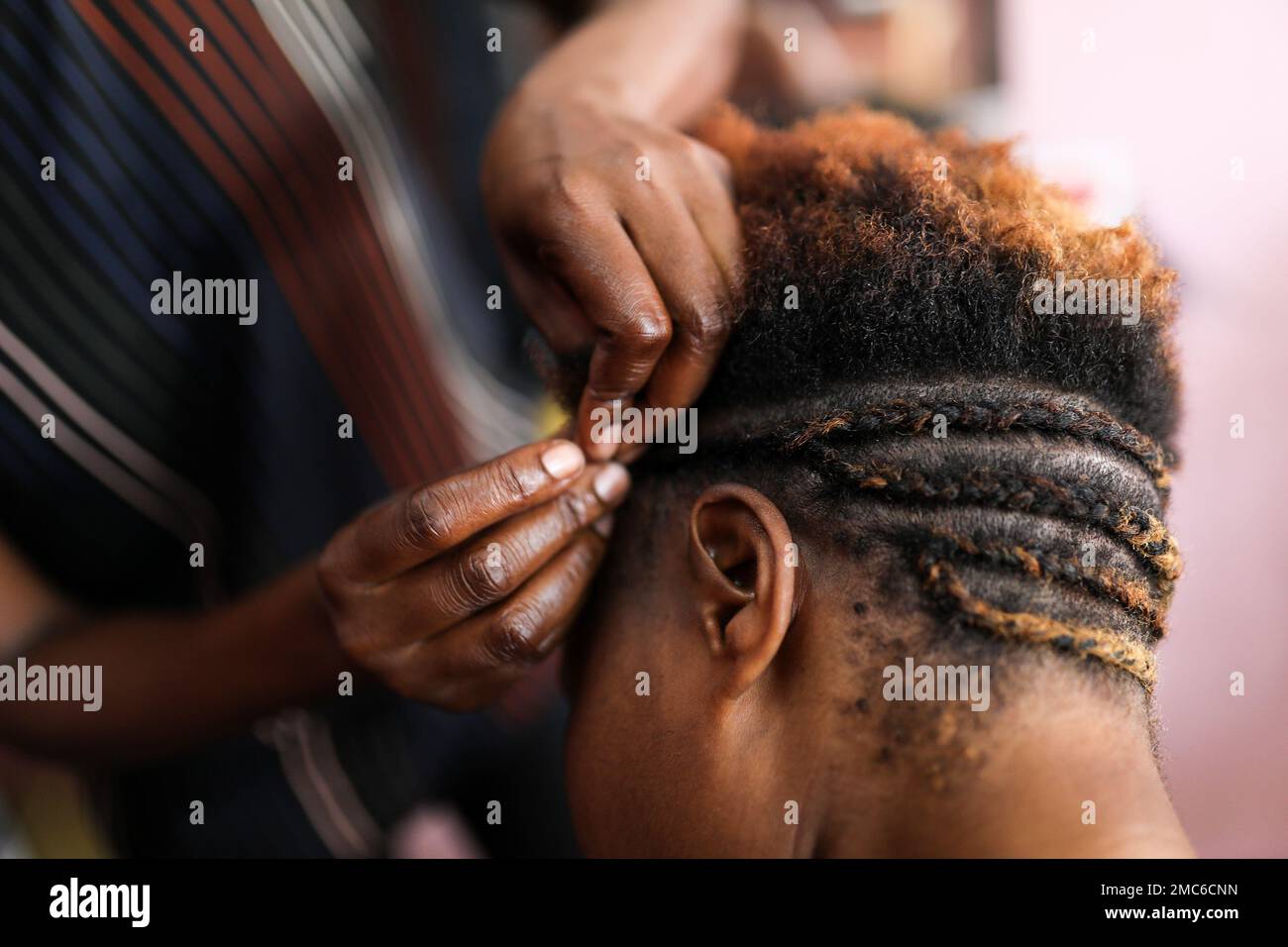 Making African braids in Ndola, Zambia on January 21, 2023 African ...