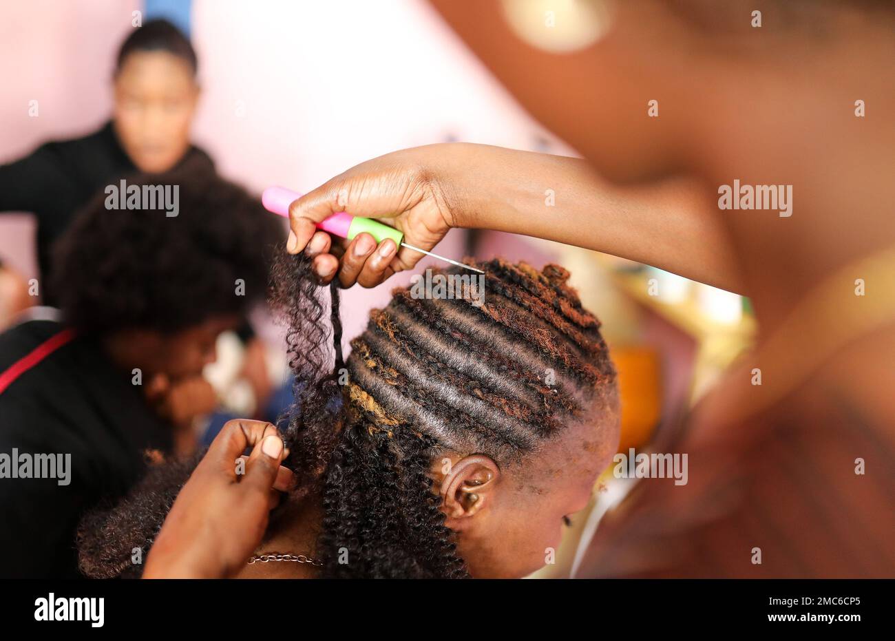 Making African braids in Ndola, Zambia on January 21, 2023 African ...