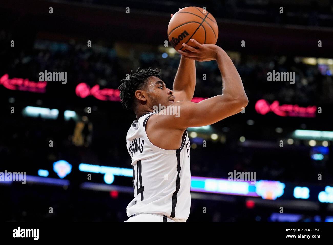 Brooklyn Nets guard Cam Thomas (24) shoots for three points during the ...