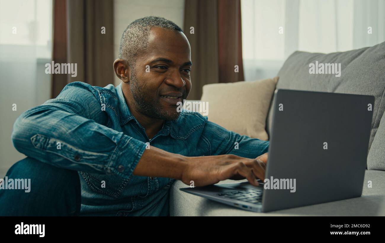 African american middle aged businessman typing laptop mature ethnic ...