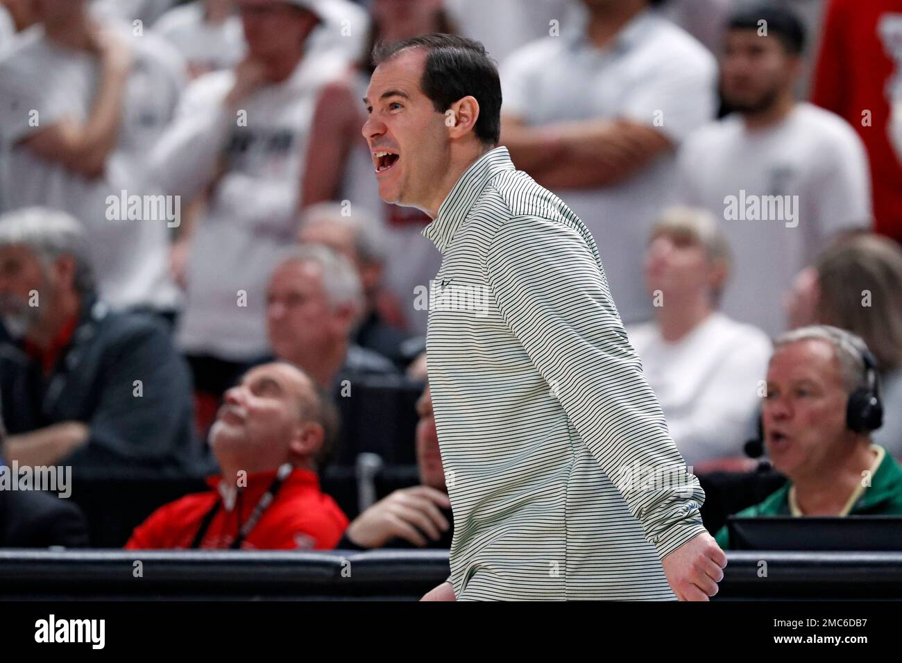 Baylor coach Drew Scott yells out to his players during the first half ...
