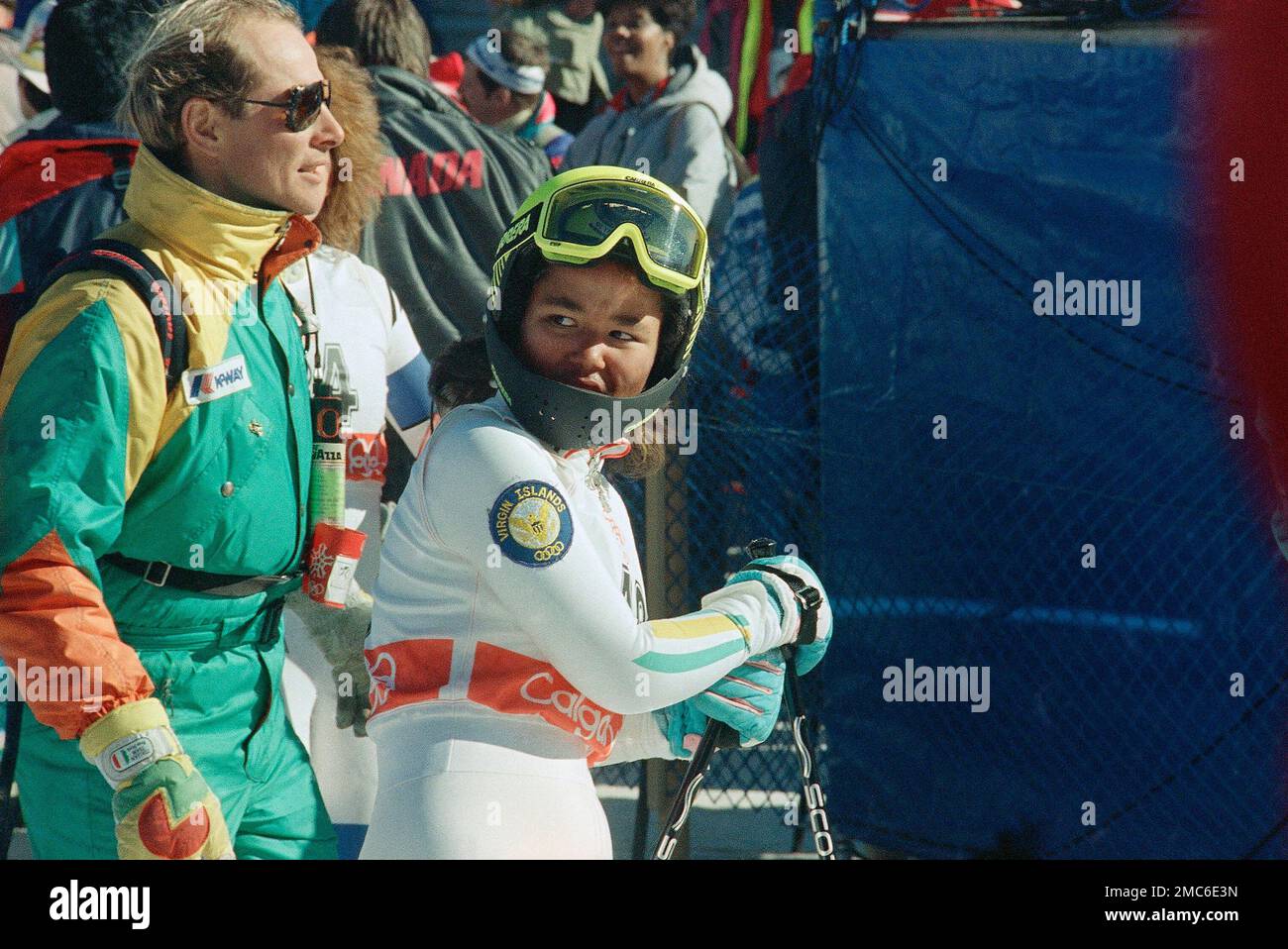 File- Skier Seba Johnson from the Virgin Islands looks back to see her ...