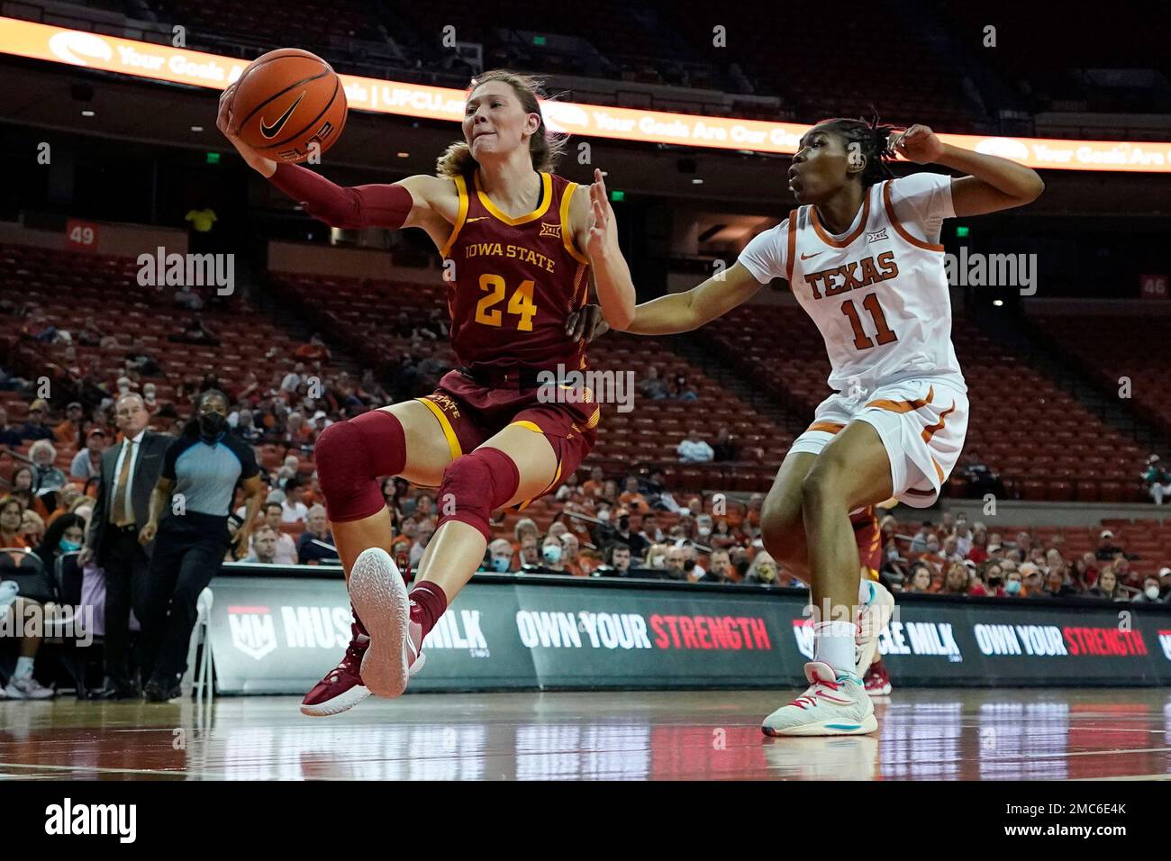 Iowa State guard Ashley Joens (24) drives to the basket against Texas ...