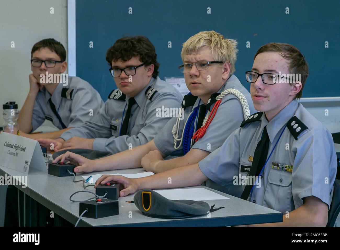 The Army JROTC Cadet team from Calumet High School listens to a ...