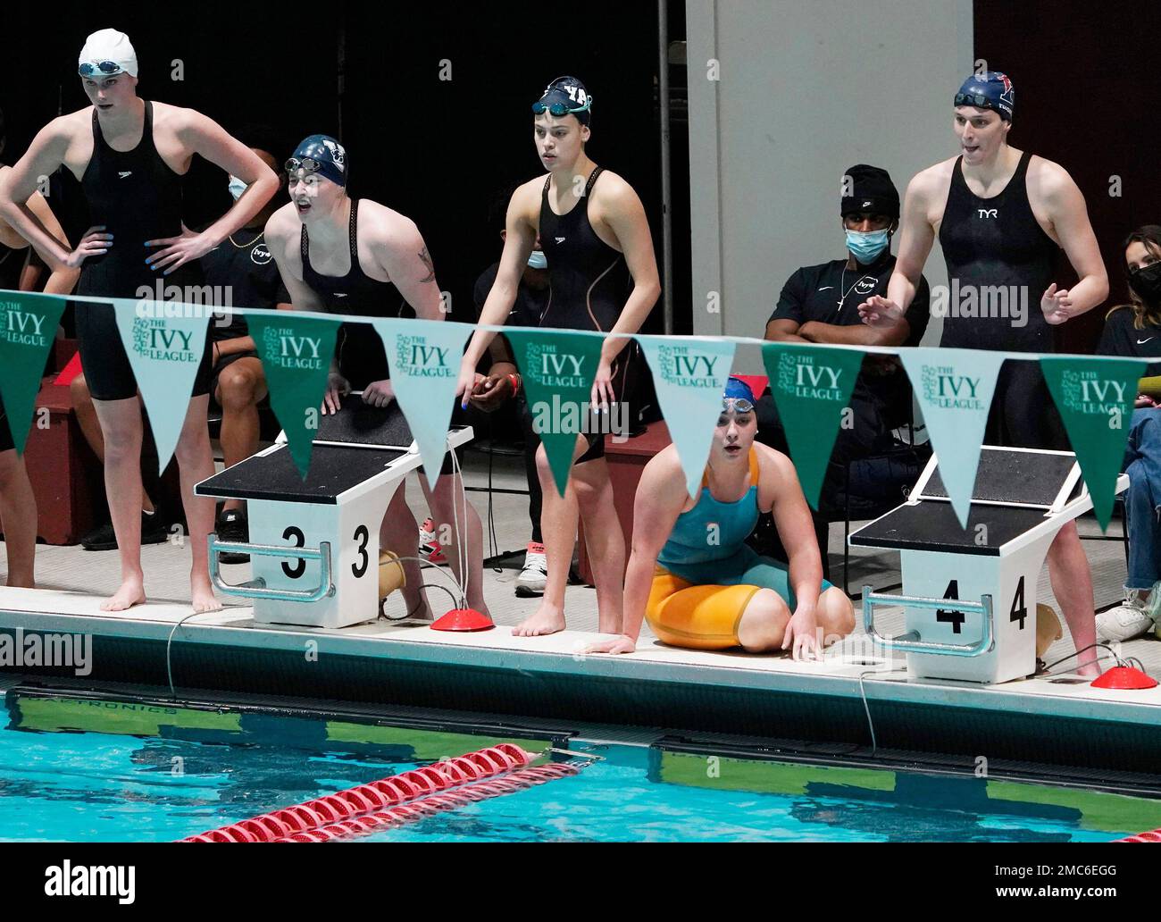 Yale's Iszac Henig, second from left, and Penn's Lia Thomas, right ...