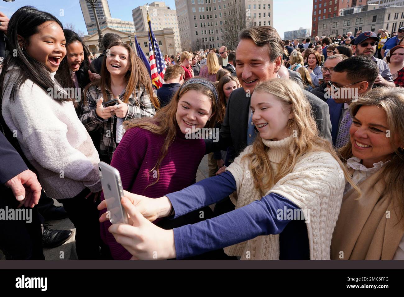 Virginia Gov. Glenn Youngkin, center, and his wife, Suzanne, right ...
