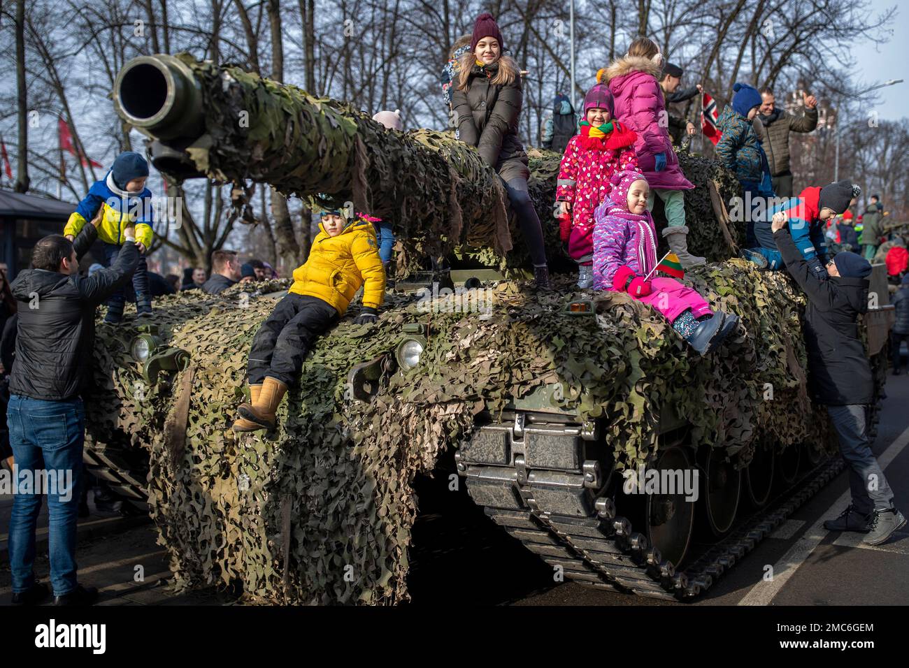 Children play on the Norwegian army main battle tank Leopard 2A4NO ...