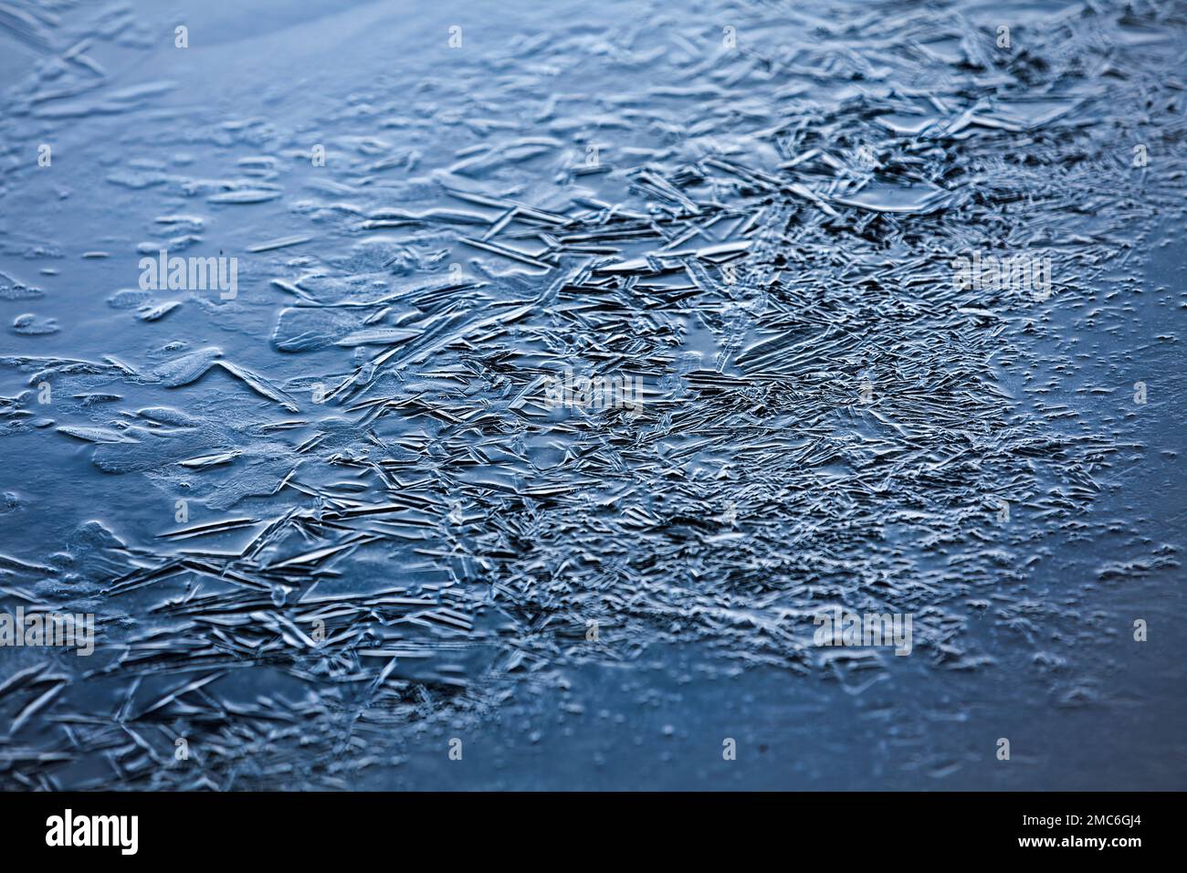 Frozen lake, structures of the water surface Stock Photo - Alamy