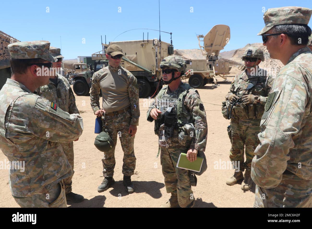 Lt. Col. Jeremy Coleman (center), commander of the 328th Brigade ...
