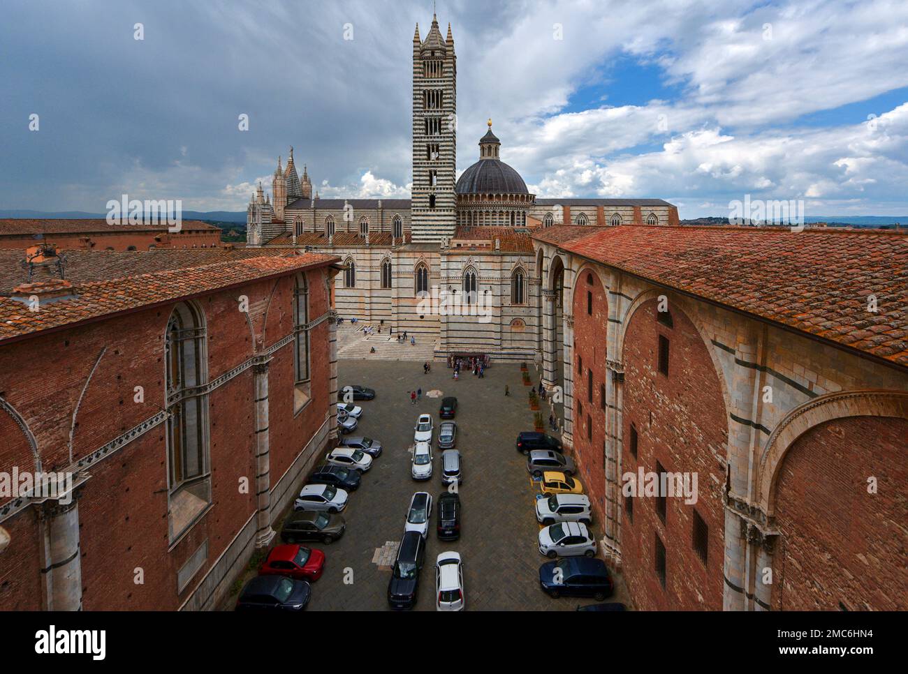 View on the city cathedral of Siena on a sunny day Stock Photo - Alamy