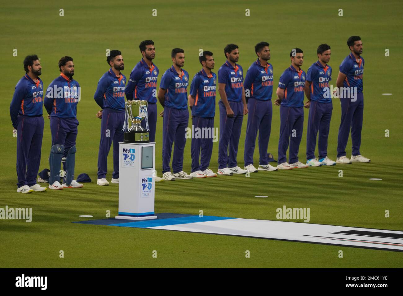 Members of Indian team stand for their national anthem ahead of their ...