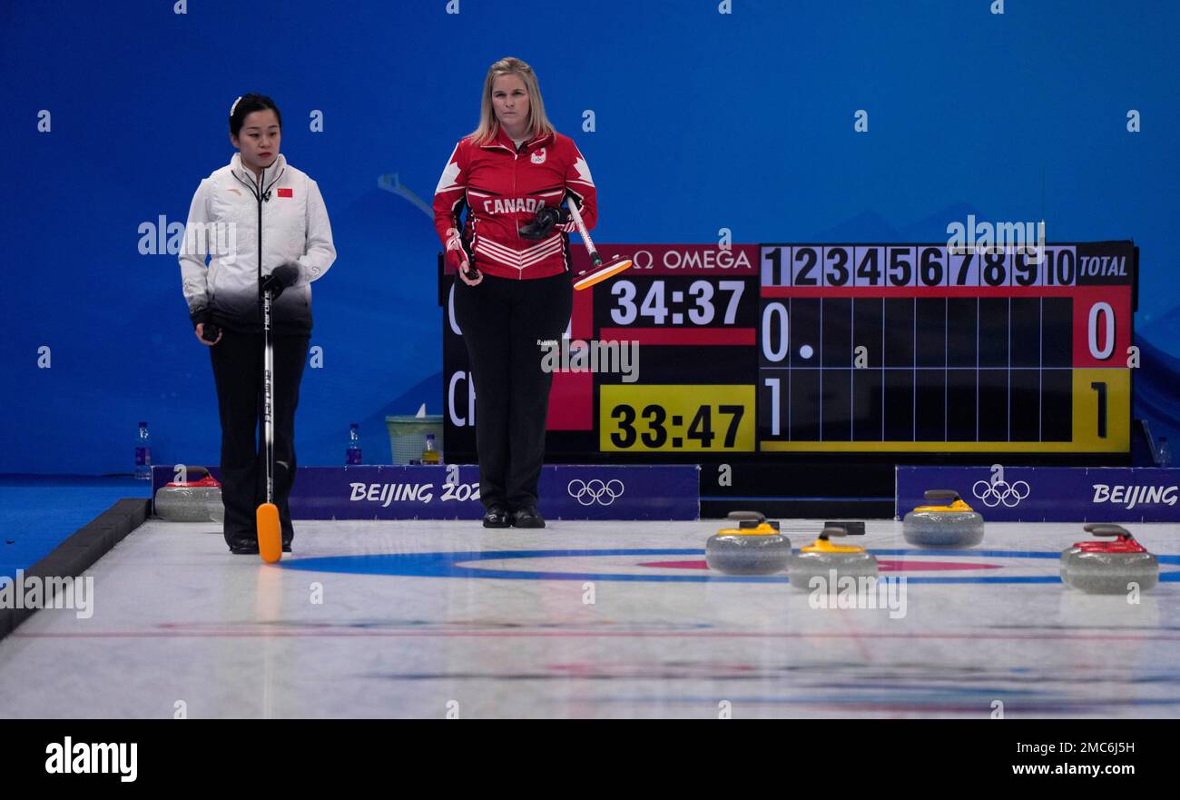 Canada's Jennifer Jones, waits for her teammate to throw a rock, during ...