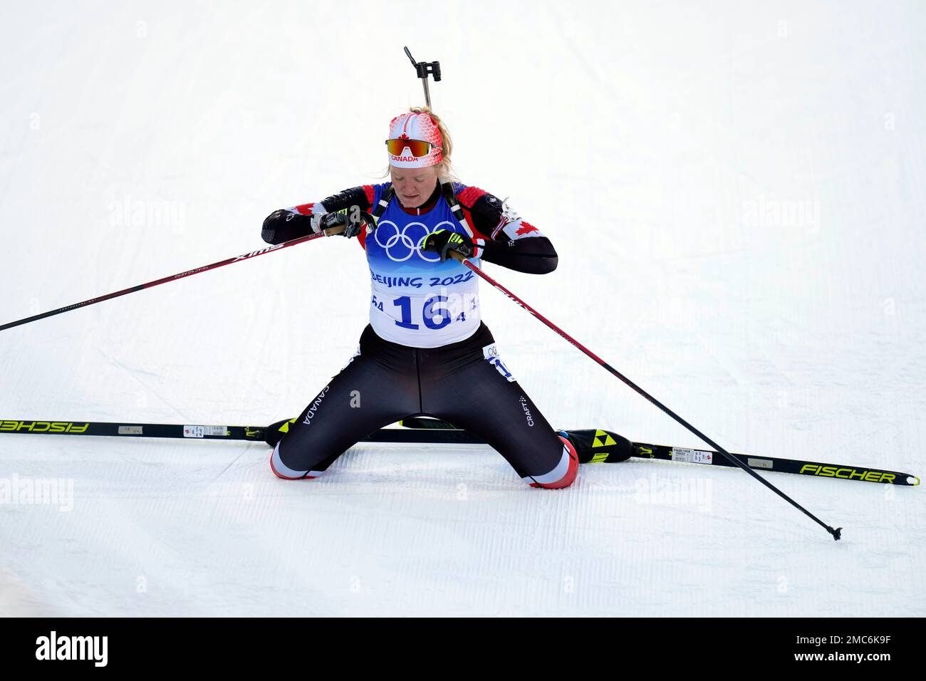 Sarah Beaudry of Canada collapses at the finish line during the women's ...