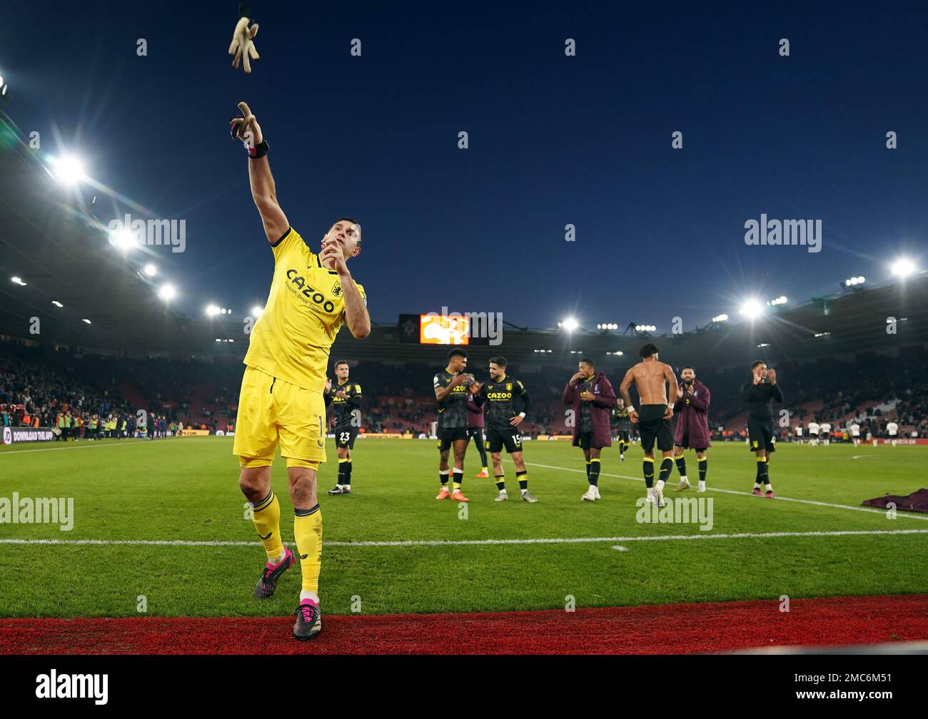 Aston Villa goalkeeper Emiliano Martinez throws one of his gloves into ...