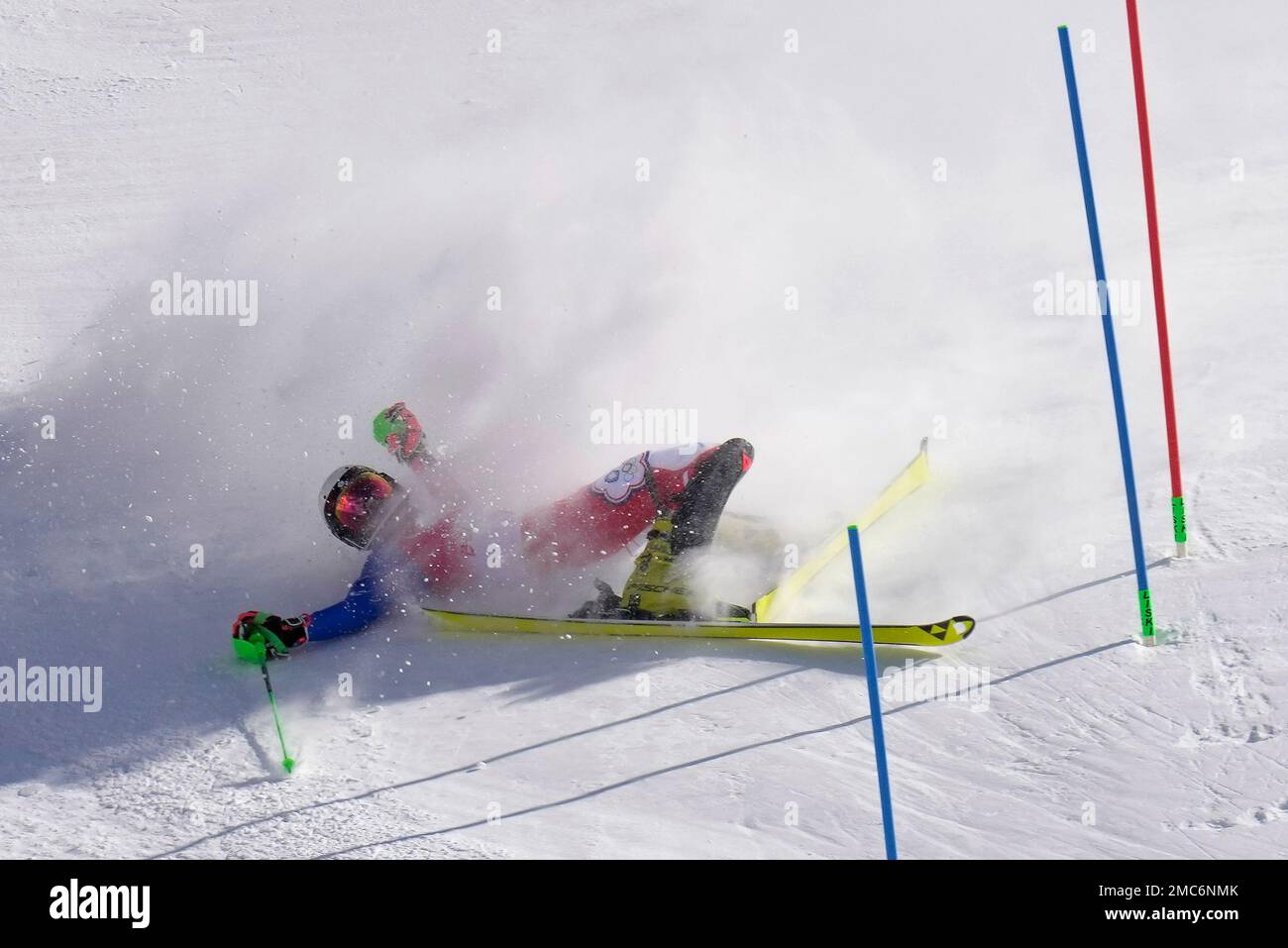 Ho Ping-jui, of Taiwan crashes out during the first run of the men's ...