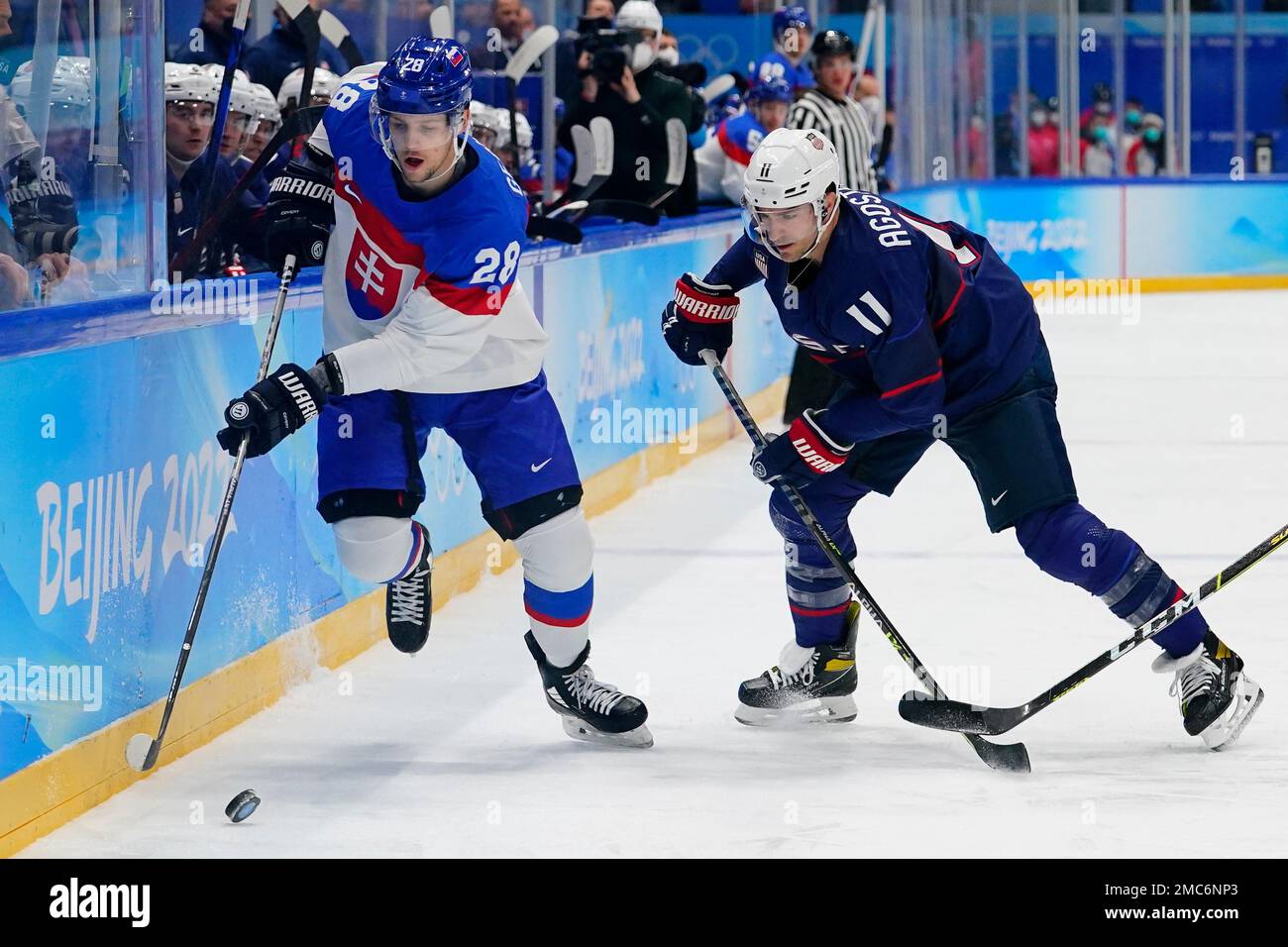 Slovakia's Martin Gernat (28) and United States' Kenny Agostino (11 ...