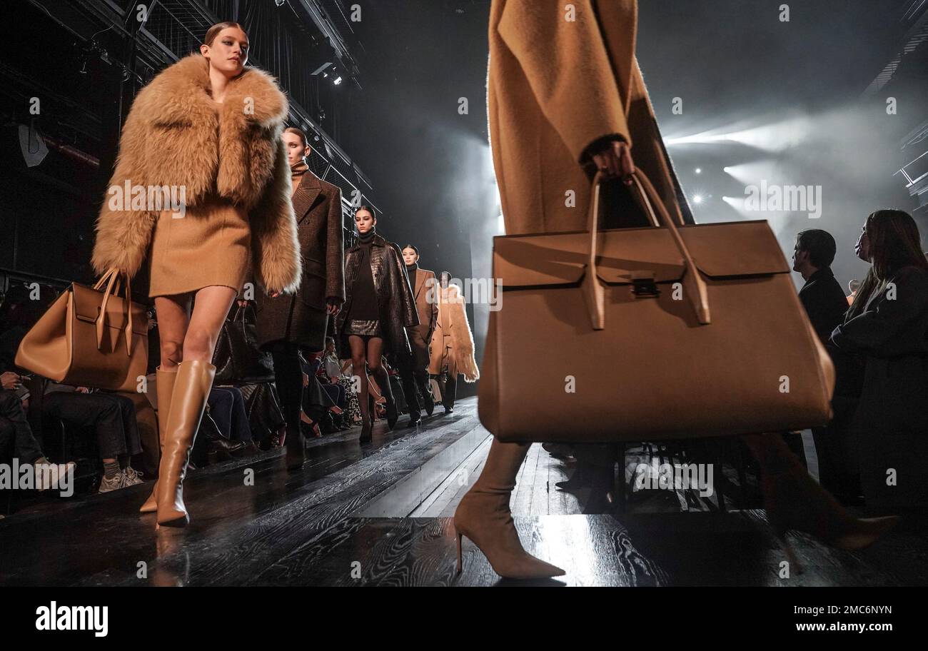 Fashion from Michael Kors' fall/winter 2022 collection is modeled ...