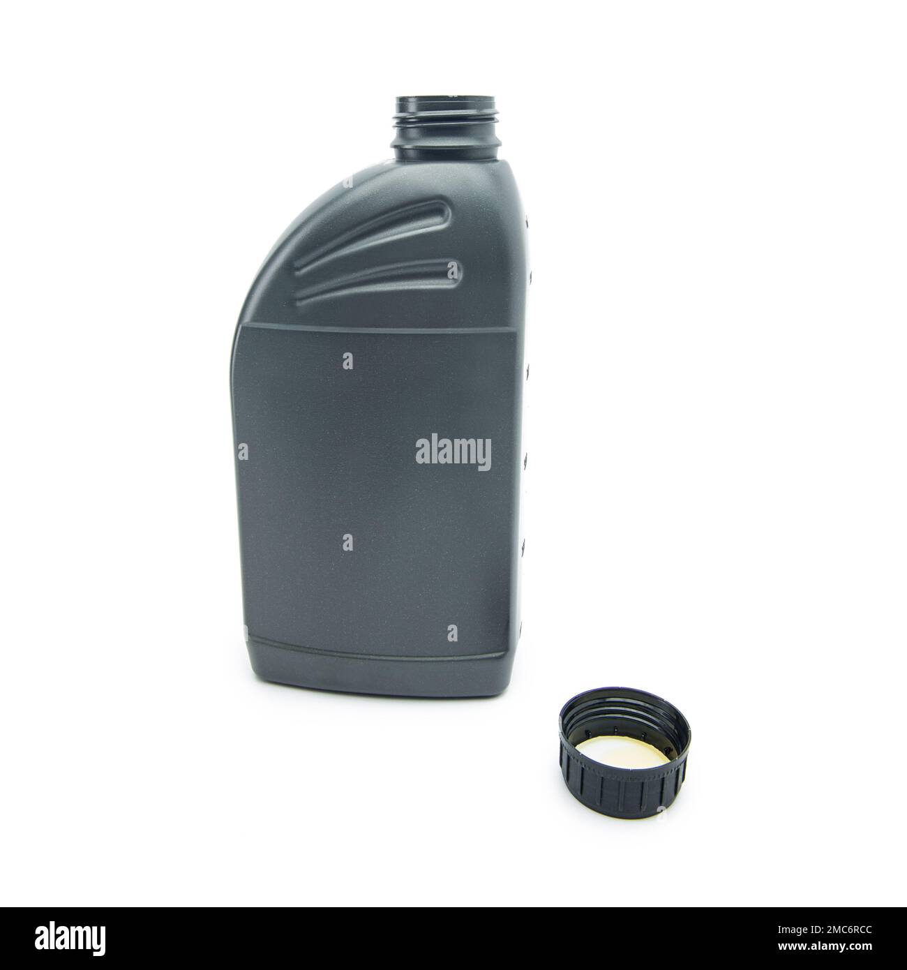 Open gray automobile oil canister on white background Stock Photo - Alamy