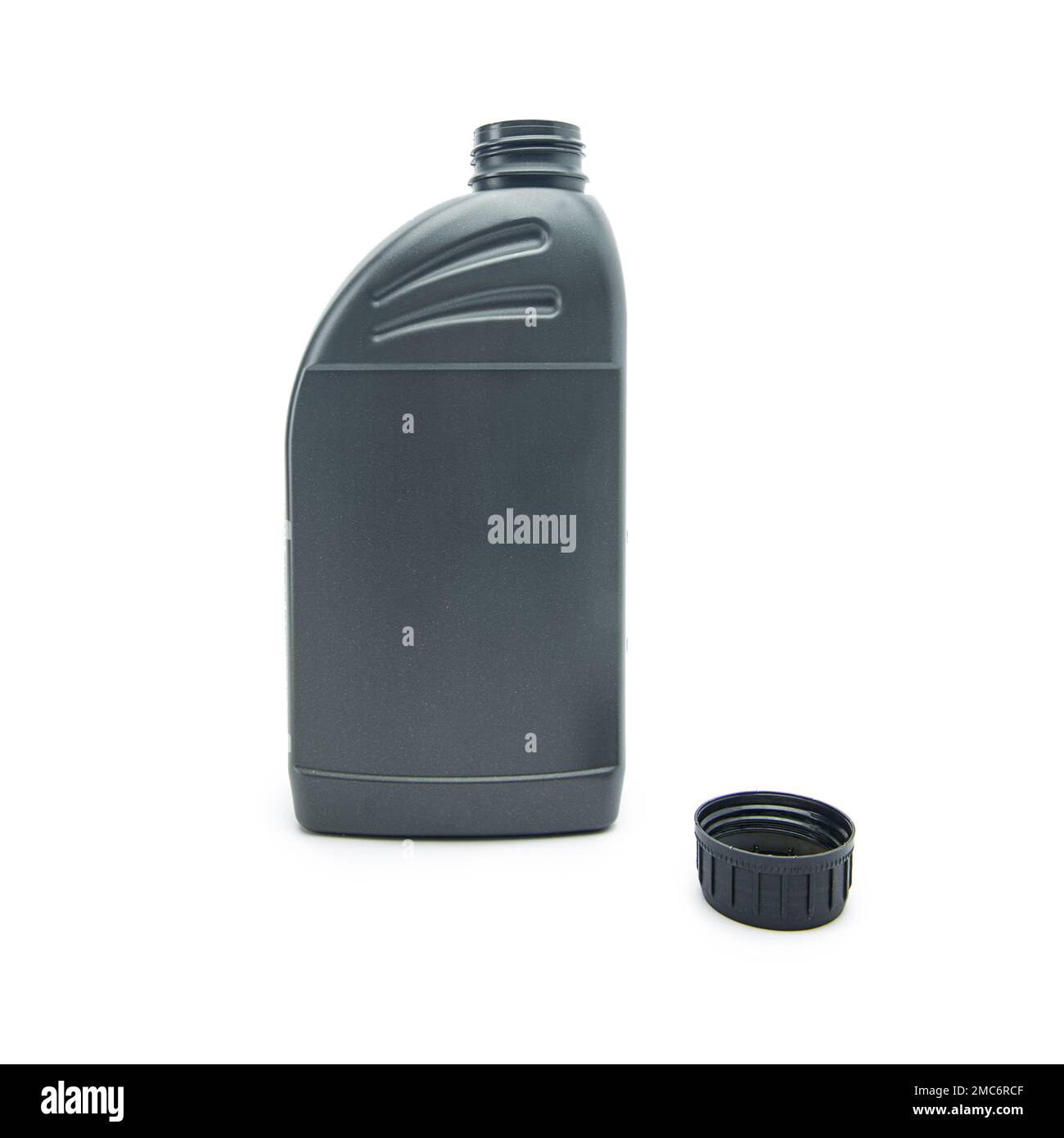 Open automobile oil canister on white background Stock Photo - Alamy