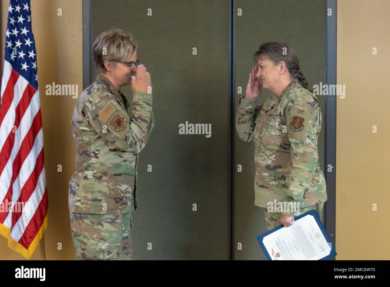 U.S. Air Force Col. Holly Shenefelt, right, receives the Air Force's ...