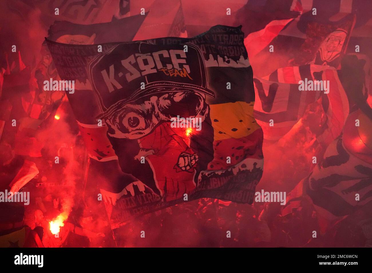 PSG supporters wave flags before the Champions League round of 16 ...