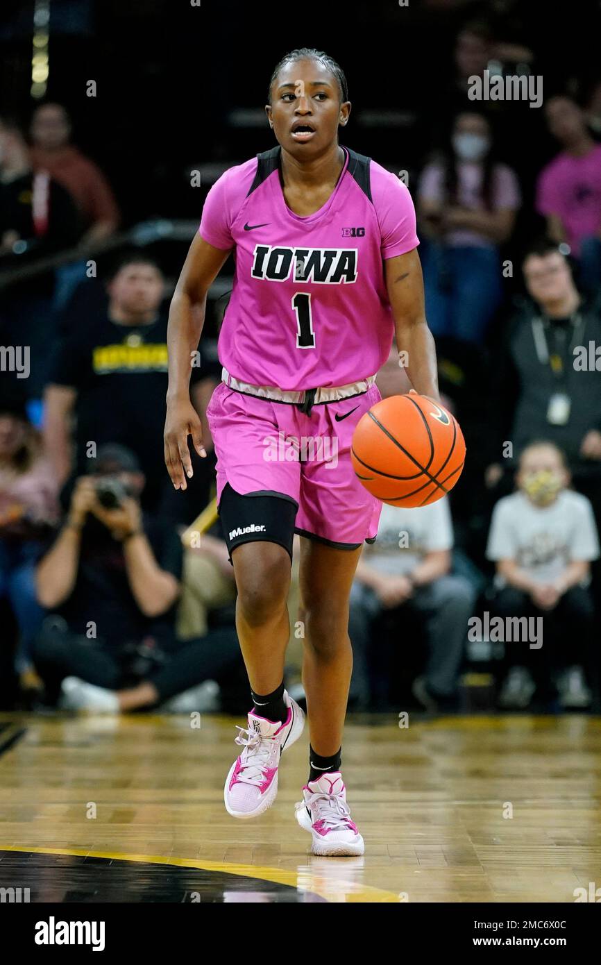Iowa guard Tomi Taiwo drives up court during the second half of an NCAA ...