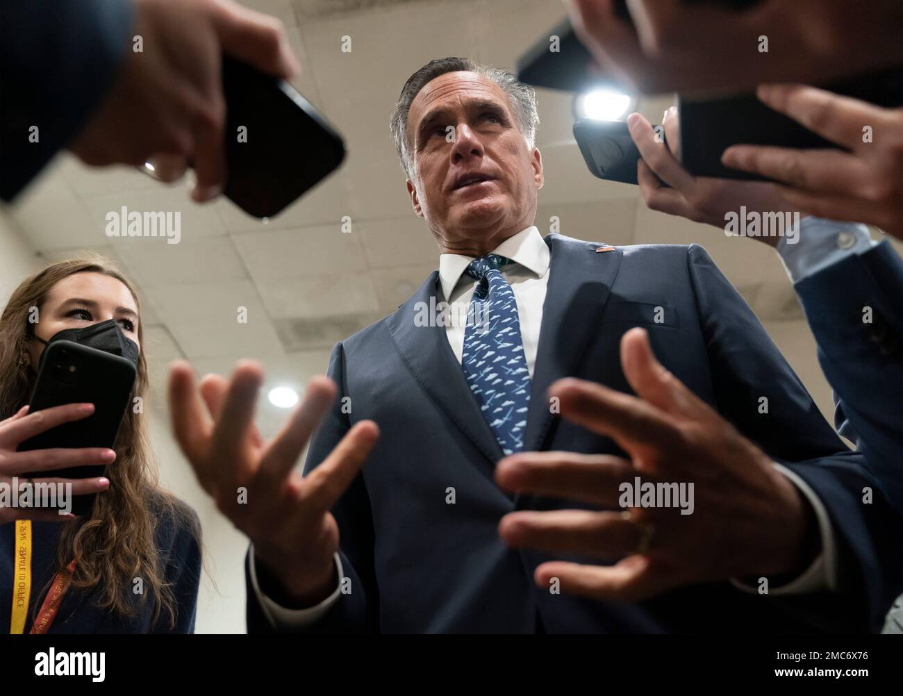 Sen. Mitt Romney, R-Utah, talks to reporters during votes at the ...