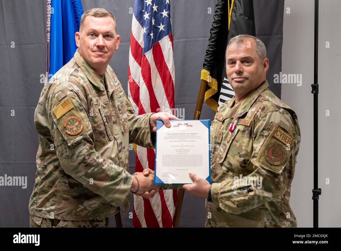 Senior Master Sgt. Dwight N. Watkins, right, network sections chief for ...