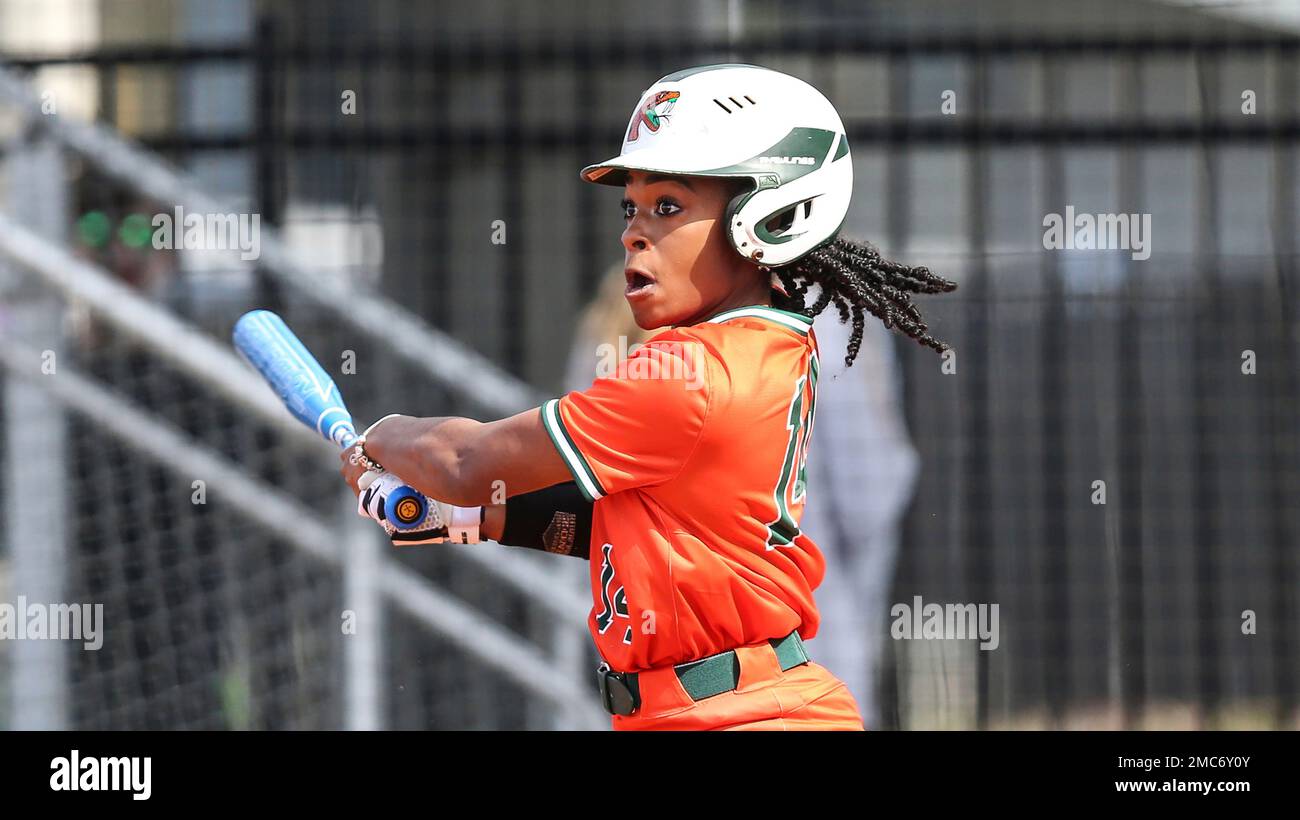 Florida A&M Jania Davis (14) bats during an NCAA softball game against ...
