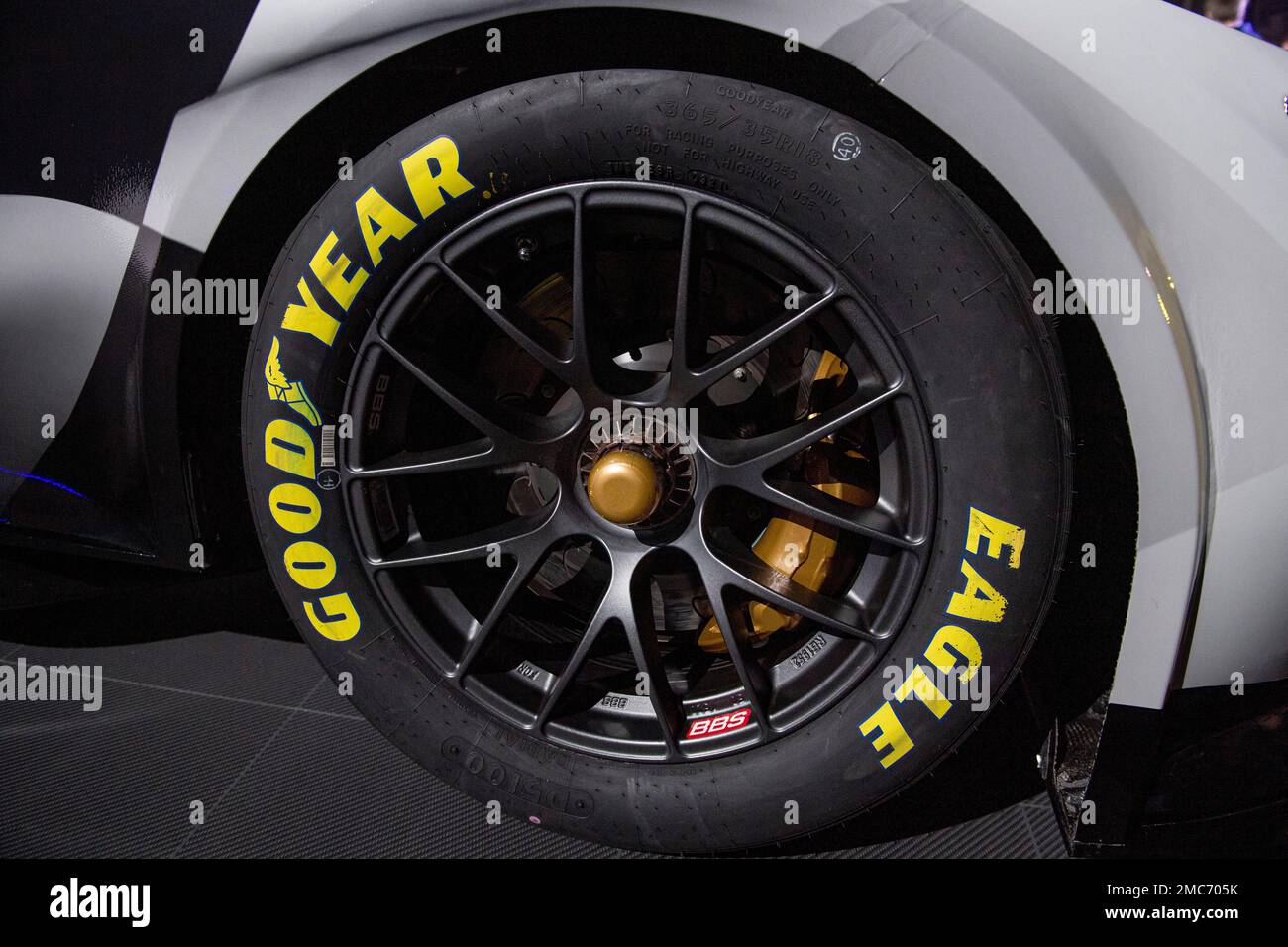 FILE - A NASCAR 2022 Next Gen car tire with a single center locking lug ...