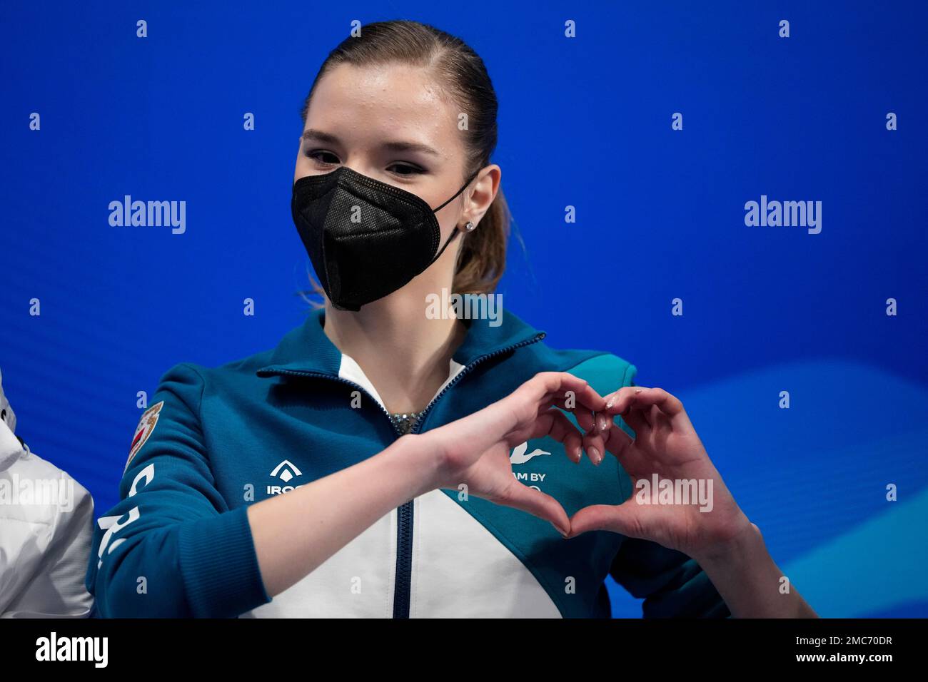 Viktoriia Safonova, of Belarus, reacts after the women's short program ...