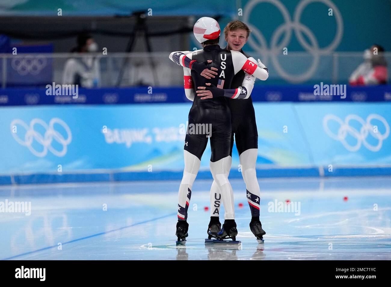 Team United States's Ethan Cepuran, facing, hugs Casey Dawson after ...