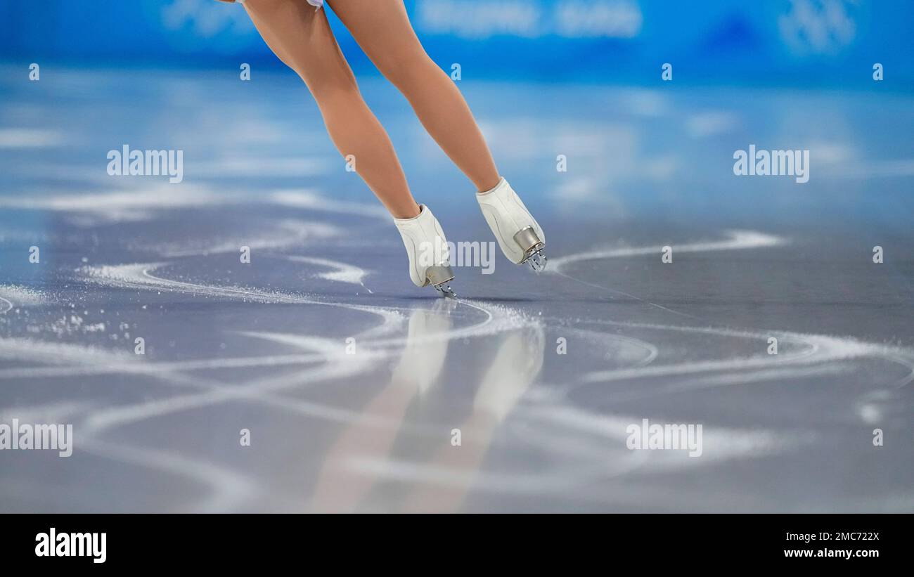 A skater warms-up ahead of the women's short program during the figure ...
