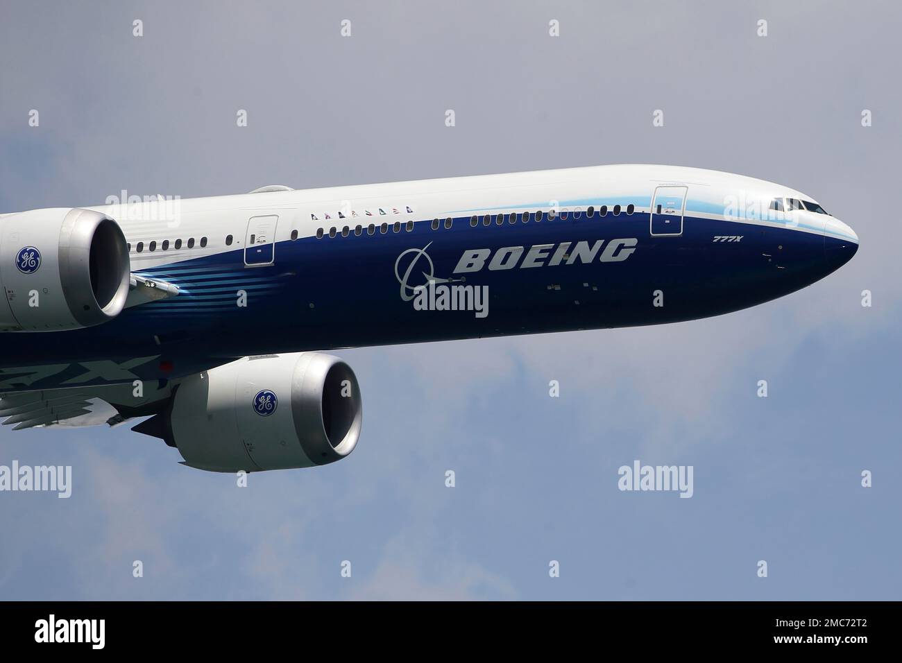 Boeing's B777-9 participates in a fly-by during the Singapore Airshow ...
