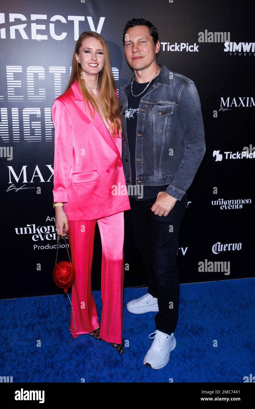 Annika Backes, left, and Tiesto attend day two of Maxim Big Game ...