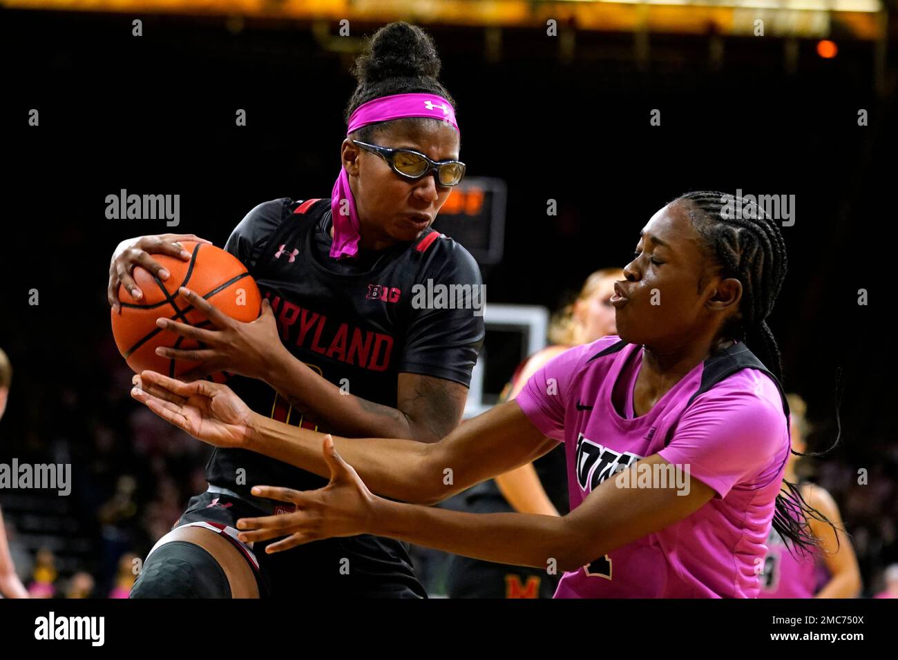 Iowa guard Tomi Taiwo, right, tries to steal the ball from Maryland ...