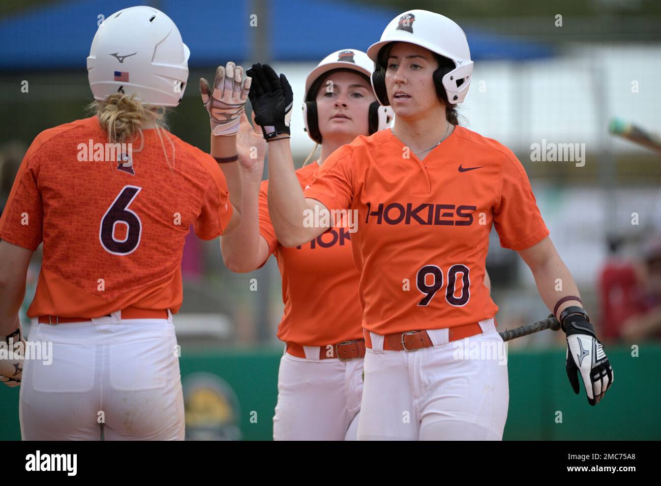 Virginia Tech's Emma Ritter (90) after scoring during an NCAA softball ...