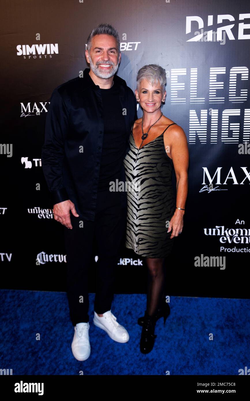 Kurt Warner left and Brenda Warner attend day two of Maxim Big Game ...
