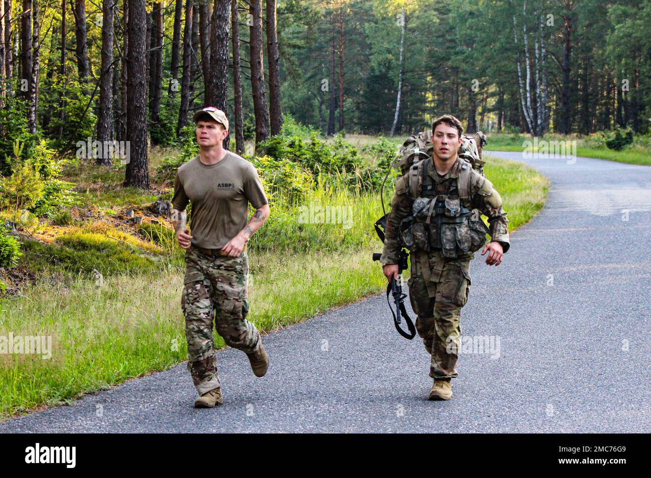 U.S. Army 1st Lt. Henry Jensen, right, a spur candidate, and Staff Sgt ...
