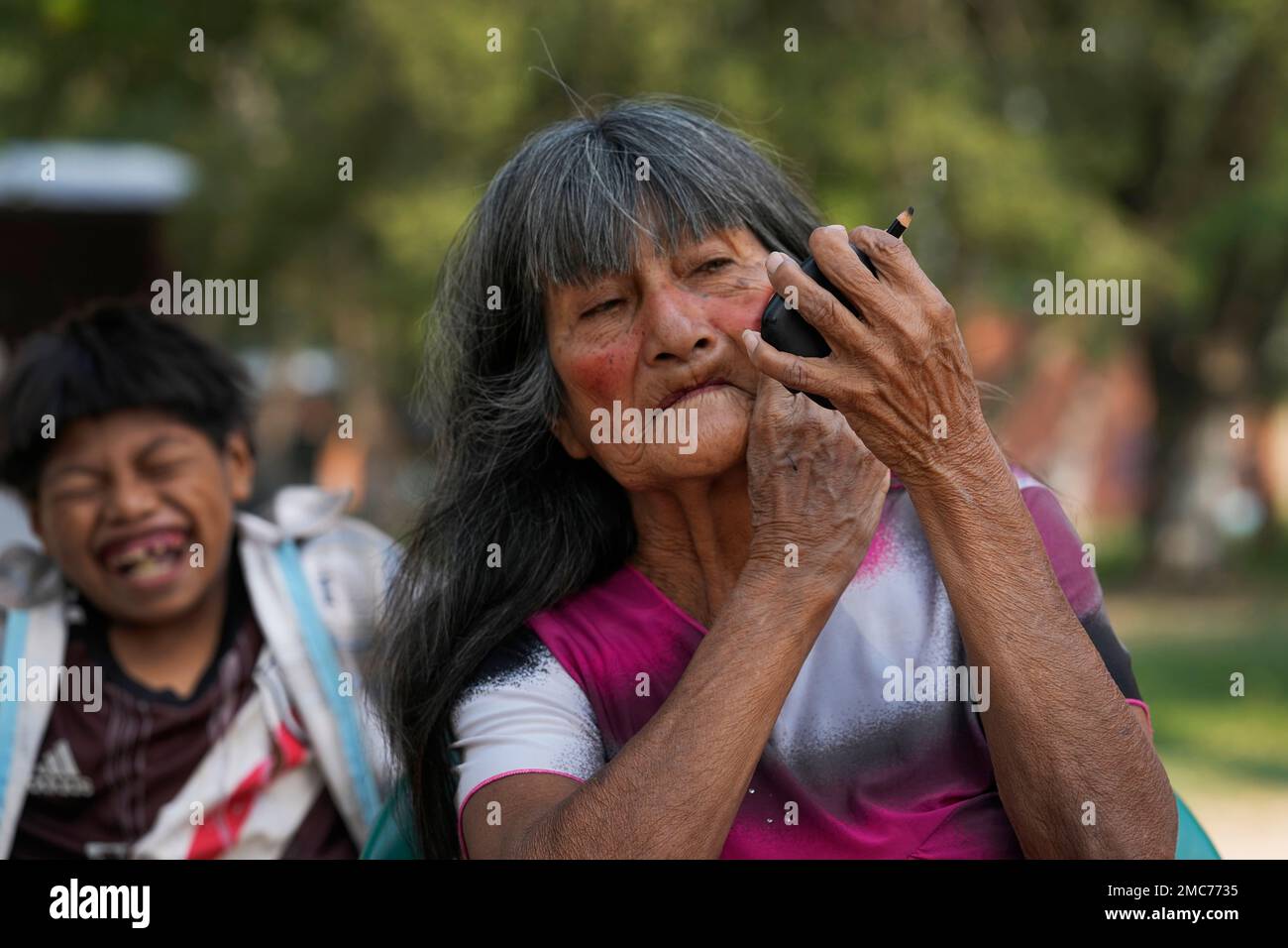 A Maka Indigenous woman gets ready for the annual celebration marking ...