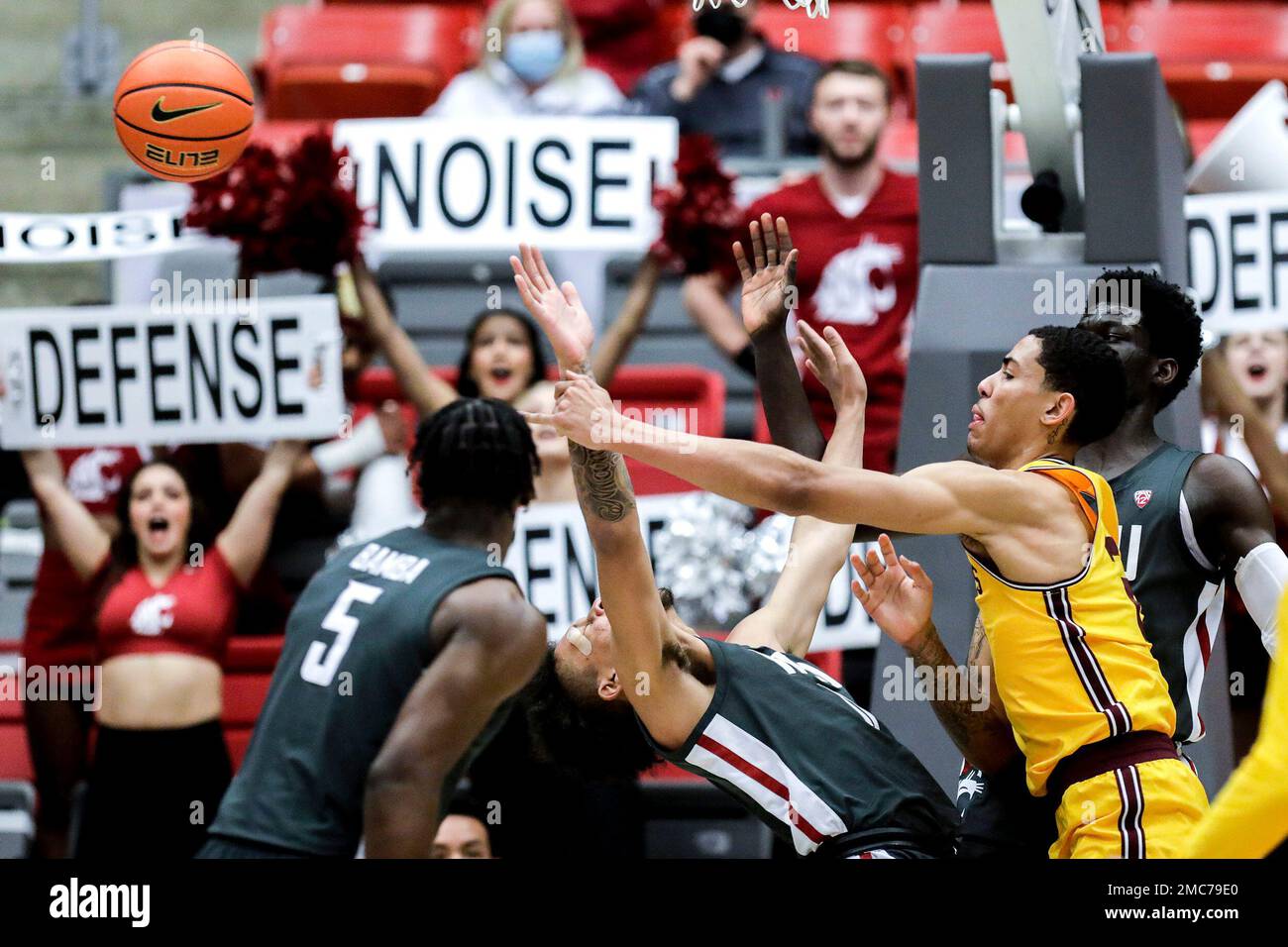 Arizona State forward Jalen Graham, right, passes the ball overhead ...