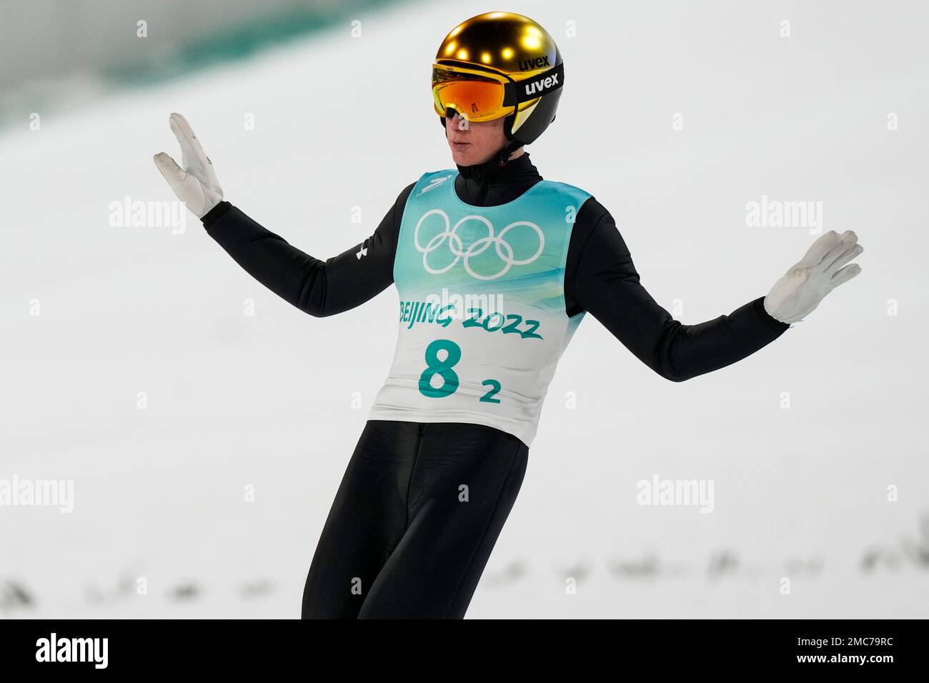 Cene Prevc, of Slovenia, gestures after his jump during a men's team ...